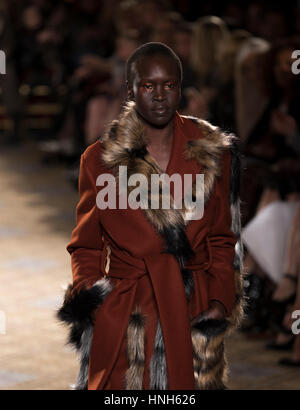 Alek Wek walks the runway during the Thom Browne Fall/Winter 2025 ...