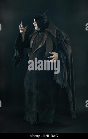 Spooky undead devil vamp with large scary nails. Hell and horror ...