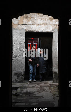 Liu'an, China's Anhui Province. 13th Feb, 2017. An elder chats with ...