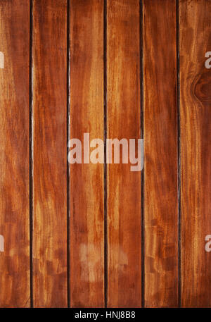 Close up of polished wooden table and the mooving light beam on its ...