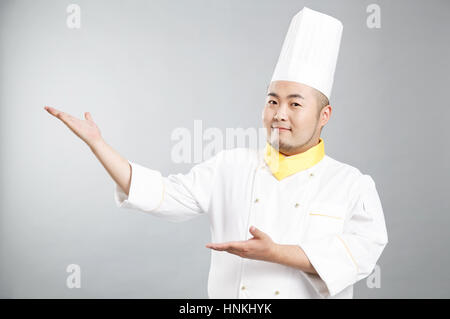 Confident young fat cook Stock Photo - Alamy