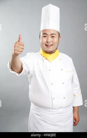 Confident young fat cook Stock Photo - Alamy