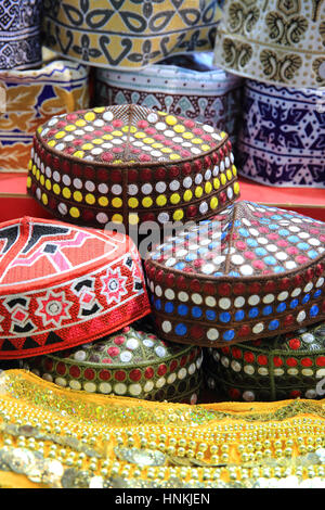 Traditional kuma caps for sale in the Mutrah Souq, Muscat, Oman Stock ...