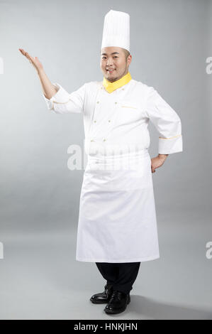 Confident young fat cook Stock Photo - Alamy