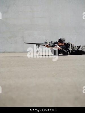 Sniper with rifle on a position Stock Photo - Alamy