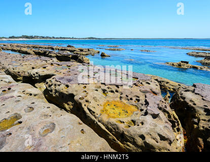 Landscape of rock formations with turquoise water in the sea shore of ...