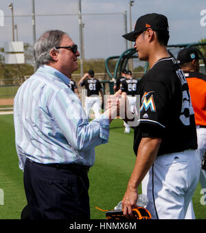 Florida Marlins' owner Jeffrey Loria cheers on as players are announced ...