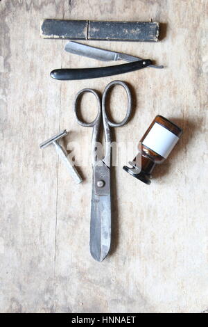 Vintage barber shop razor tools on wooden background Stock Photo - Alamy