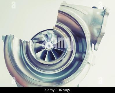 Turbocharger structure scheme with cross section,toned photo with ...