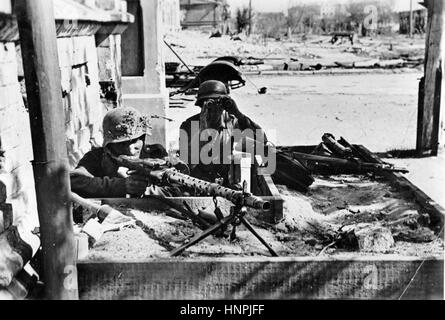 The Nazi propaganda image shows a street scene in the town of ...