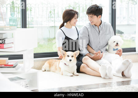 Harmonious couple with pets Stock Photo - Alamy