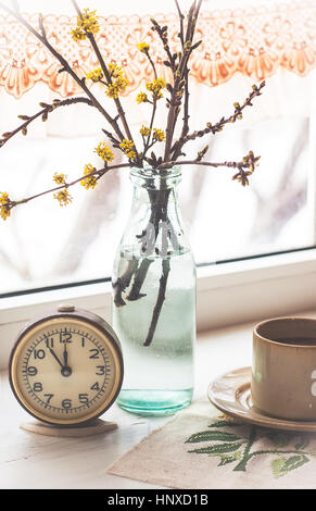 Retro alarm clock with coffee beans. Morning coffee after waking up ...