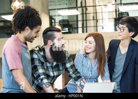 Asian business team collaborating on UI UX design creative process in ...