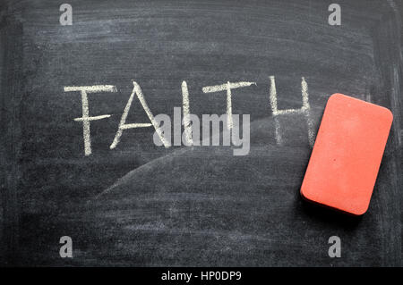 erasing freedom, hand written word on blackboard being erased concept ...