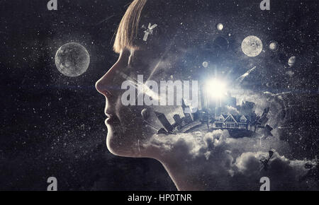 Profile of dreaming kid girl against night city background Stock Photo ...