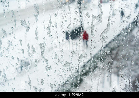Pedestrians walk through a snow storm on Boxing Day in Toronto, on ...
