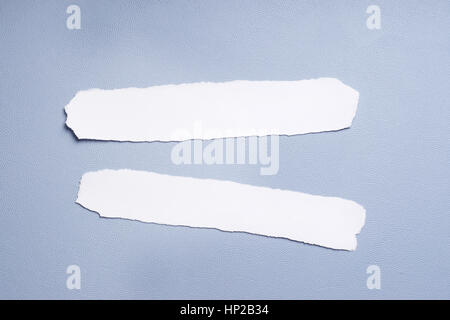 two empty paper white pieces of puzzles in female hands, puzzle ...