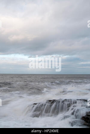 Waves breaking against the rocks at Souter Beach, National Trust ...