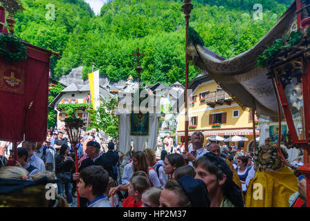Hallstatt, Corpus Christi procession in the market square; Church flags ...