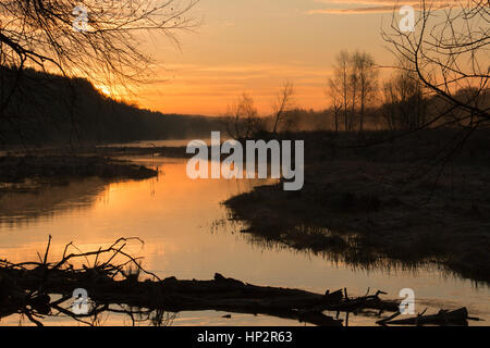 Beginning of sunrise over the river Stock Photo - Alamy