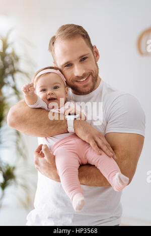 Amused kid girl having fun with her father Stock Photo - Alamy