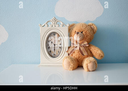 Baby toy on the table, light background Stock Photo - Alamy