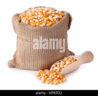 A wooden spoon full of popcorn seeds on a marble background Stock Photo ...