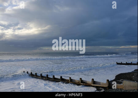 Beach with timber groynes at Tywyn on the west coast of Wales Stock ...