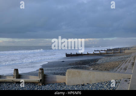 Beach with timber groynes at Tywyn on the west coast of Wales Stock ...