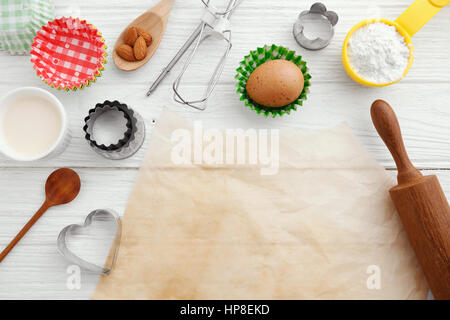 Baking background with baking paper and tools Stock Photo - Alamy