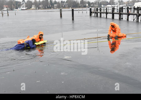 Members of the DLRG German Life Saving Society watch swimmer in the ...
