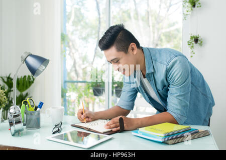 indian college student doing homework Stock Photo - Alamy