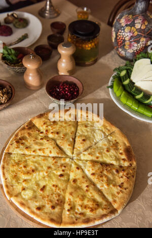 Ossetian baked pie Stock Photo - Alamy