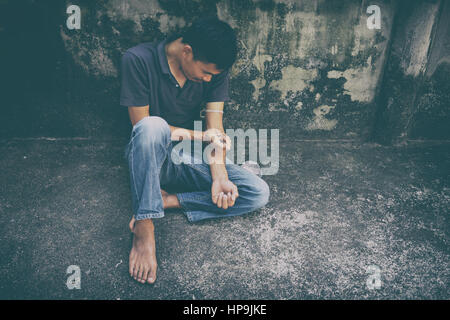 drug addict man with syringe in action Stock Photo - Alamy