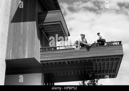 Architect Ralph Anderson, wearing sweater, in 1961 at a house he ...