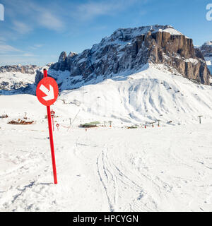 Red post sign marking the edge of ski slope Stock Photo - Alamy