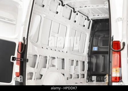 empty minivan car with open doors on city parking Stock Photo - Alamy