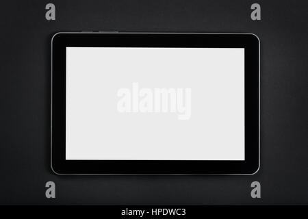 Modern generic tablet with blank screen on wooden table Stock Photo - Alamy
