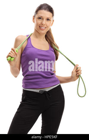 Confident woman with jump rope around her neck standing on street Stock ...