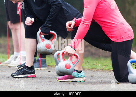 People doing keep fit exercise in the park Stock Photo - Alamy