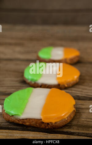 St. Patricks Day three cookies with irish flag on white background ...