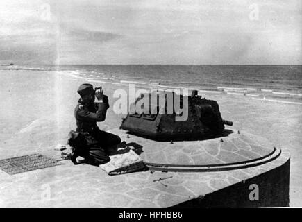 The Nazi propaganda image shows a soldier from a German anti-aircraft ...