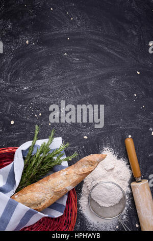 Fresh French baguette on grunge background Stock Photo - Alamy