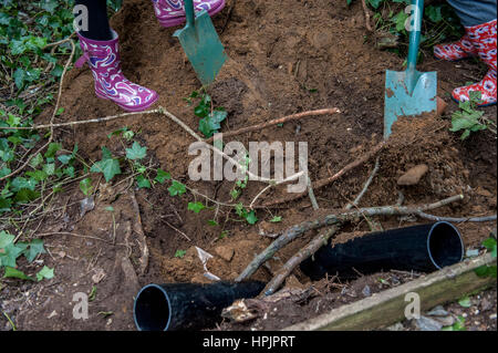 kids build hibernaculum Stock Photo - Alamy