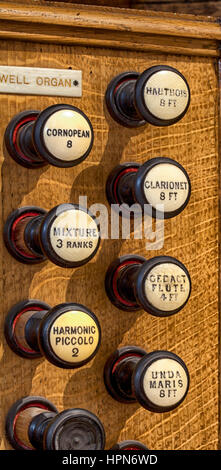 close up of pipe organ stops, St Mary's church, West Dean, near Stock ...