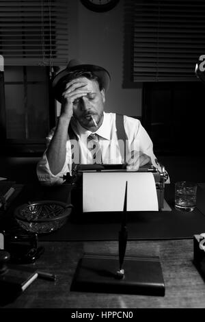 1950s style journalist working in his office at night, he is typing ...