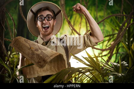 Smiling explorer in the jungle holding skull and machete Stock Photo ...