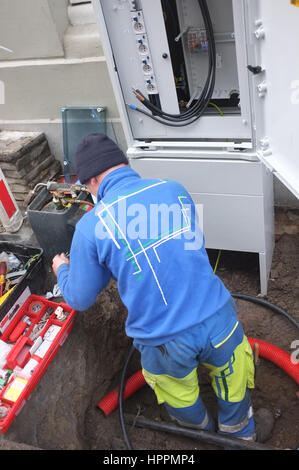 Cable utility box in house front yard Stock Photo - Alamy