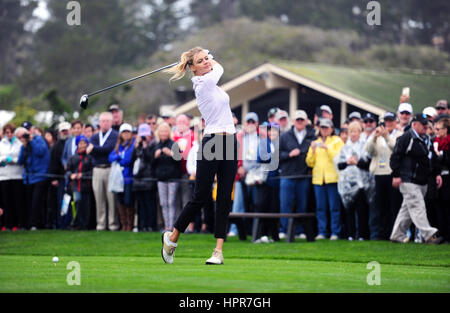 Model Kelly Rohrbach tees off during the AT&T Pebble Beach National Pro ...