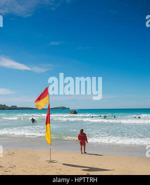Lifeguard keeping watch on the beach at Olhos de Agua Algarve Stock ...